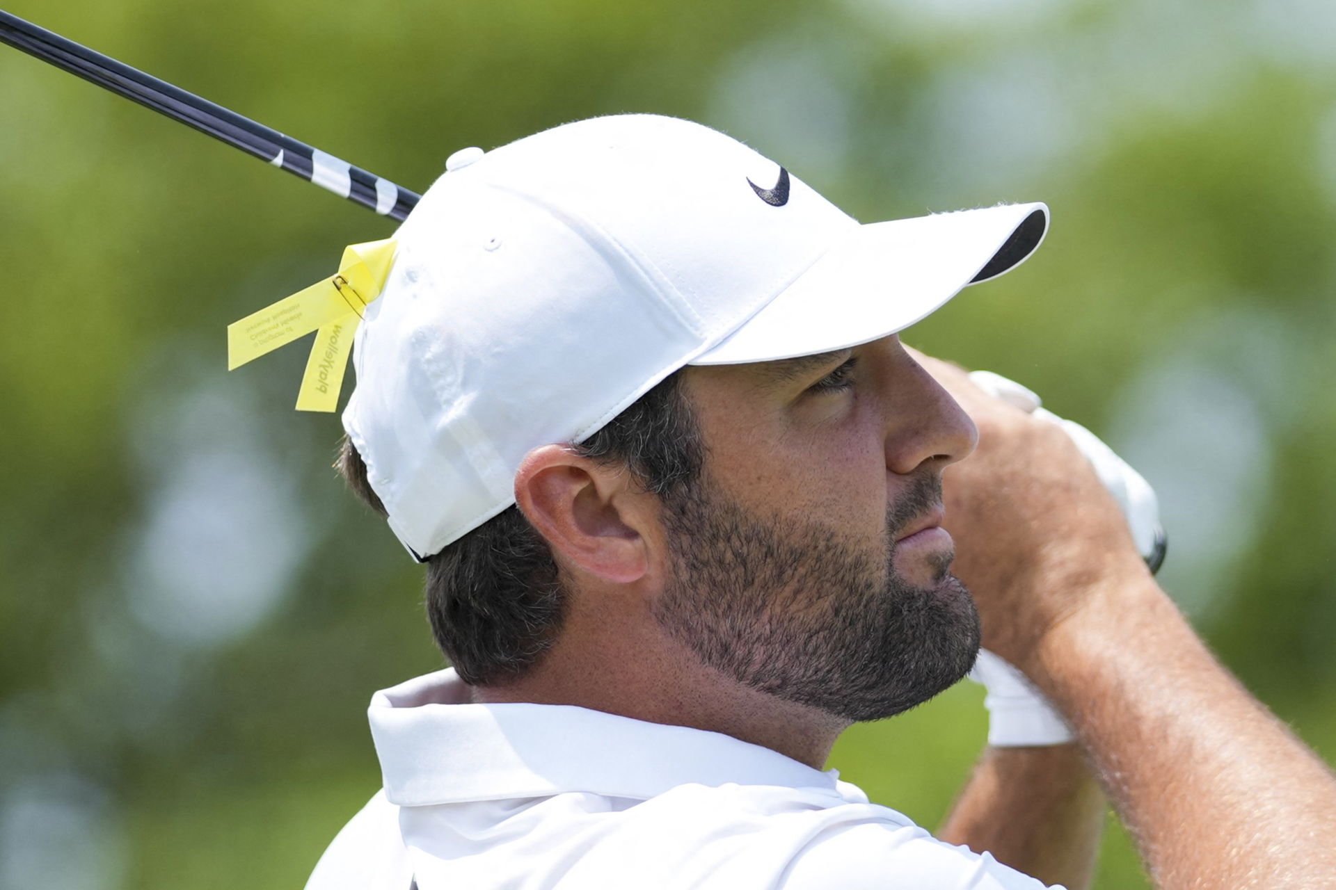 Why PGA Tour players are wearing yellow ribbons on their hats at the ...